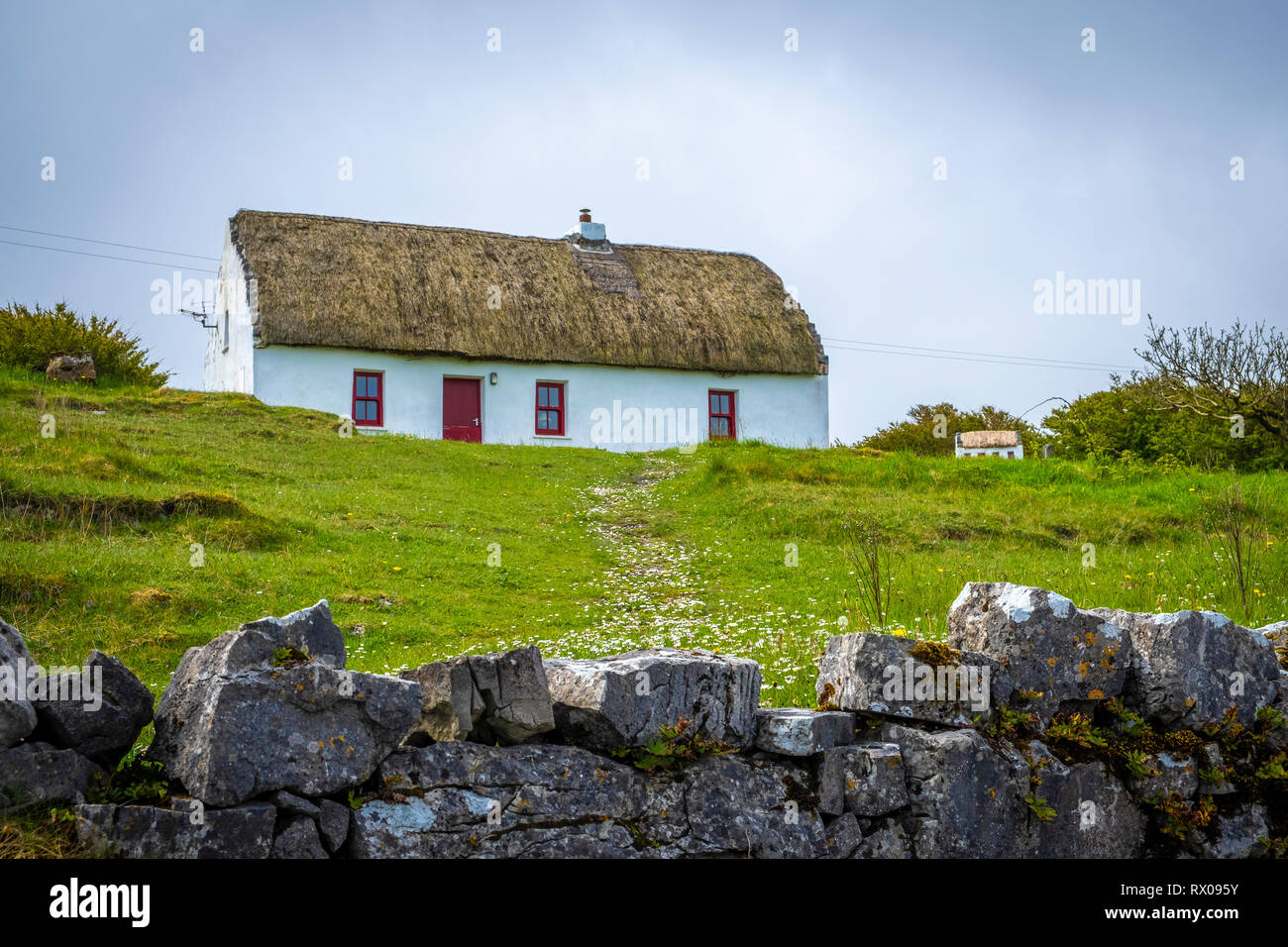 common reed houes on Inishmore, Aran Island, Ireland Stock Photo - Alamy