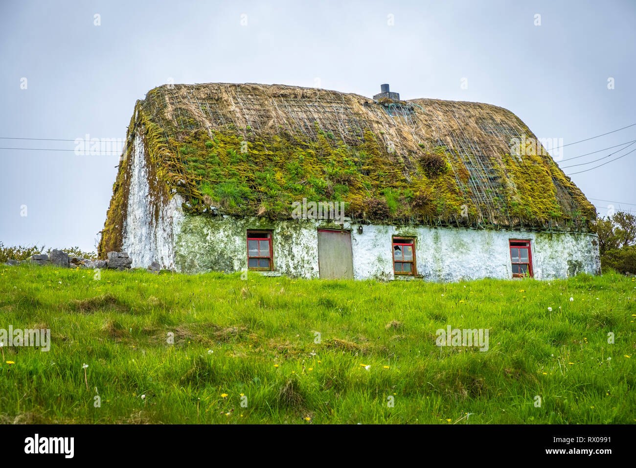 common reed houes on Inishmore, Aran Island, Ireland Stock Photo - Alamy