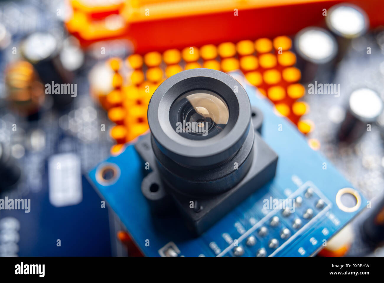 Camera with lens on electronic integrated circuit Board. The concept of ...