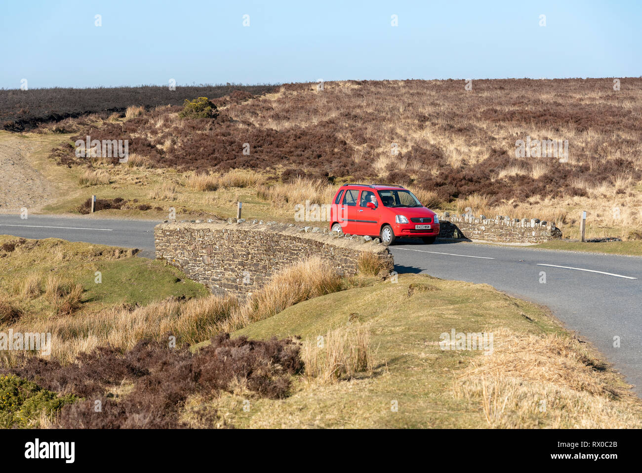Exmoor National Park, Somerset, England, UK. March 2019. A tourist car ...
