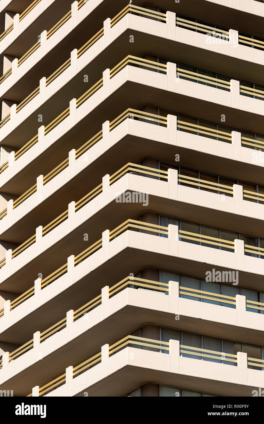 A section of a tall building with many floors stacked up Stock Photo ...