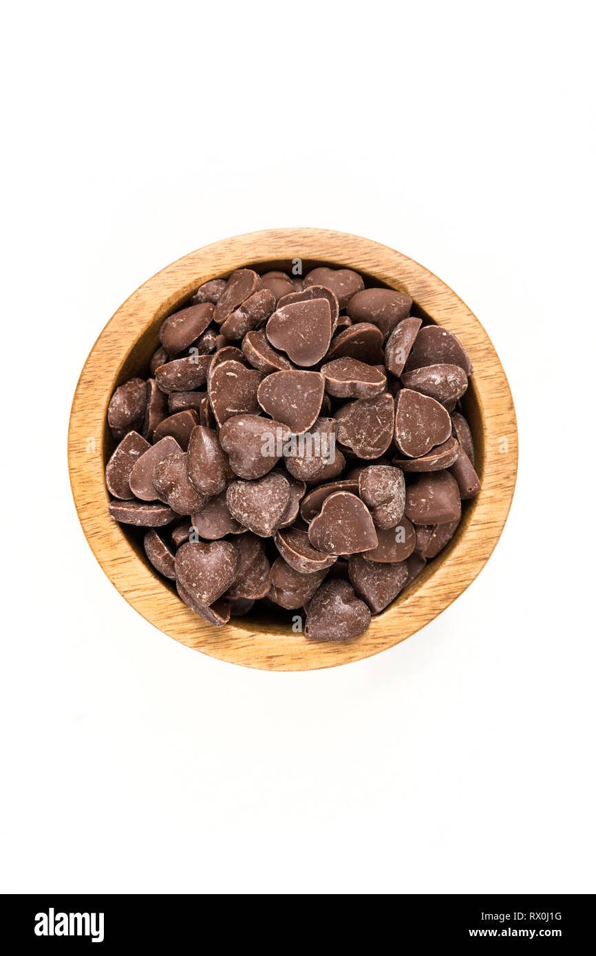 Brown candy heart shaped milk chocolate chip pieces Stock Photo - Alamy