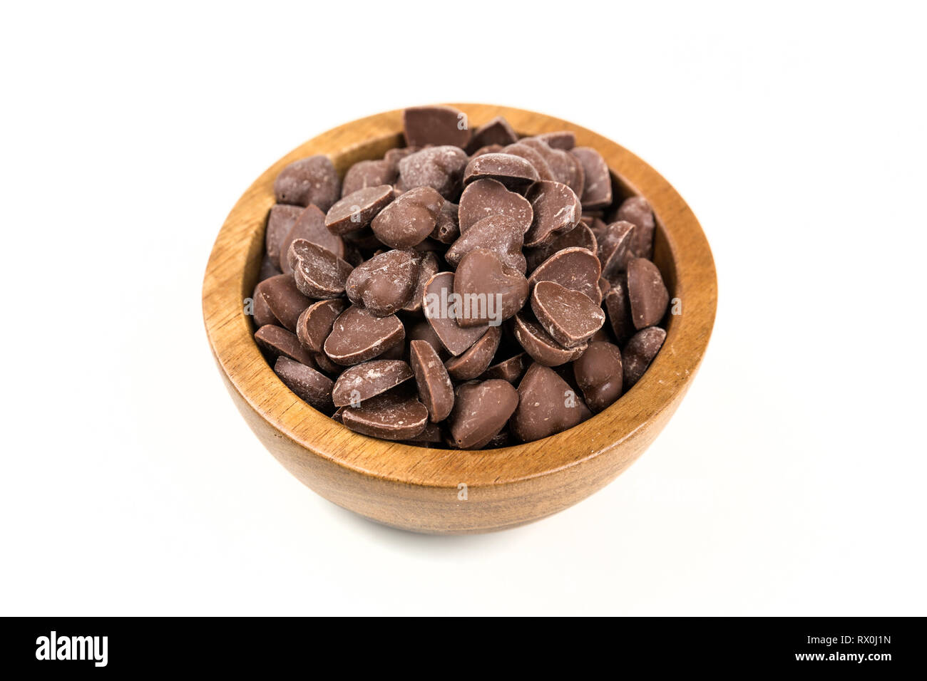 Brown candy heart shaped milk chocolate chip pieces Stock Photo - Alamy