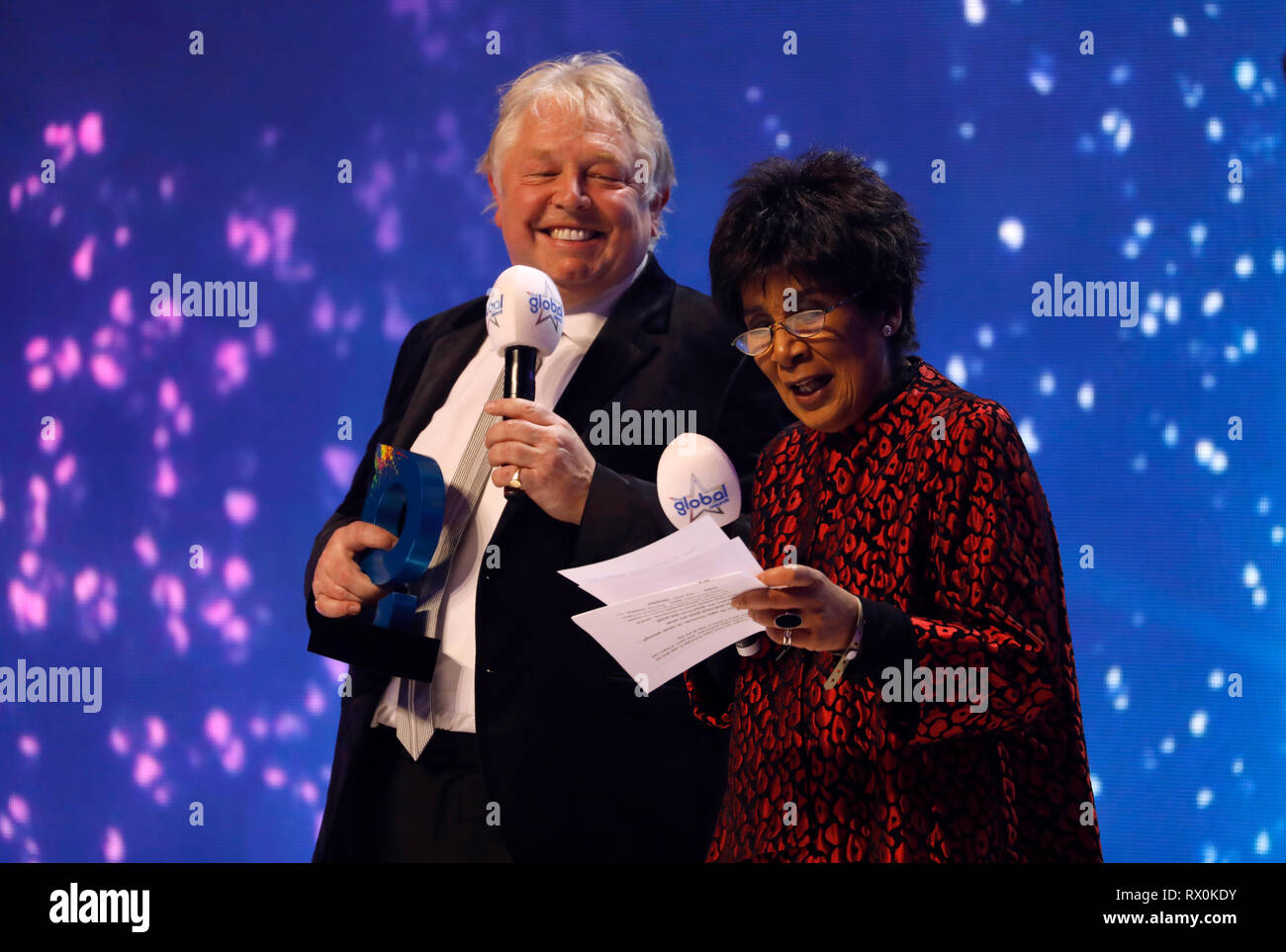 Moira Stuart and Nick Ferrari on stage during The Global Awards 2019 ...