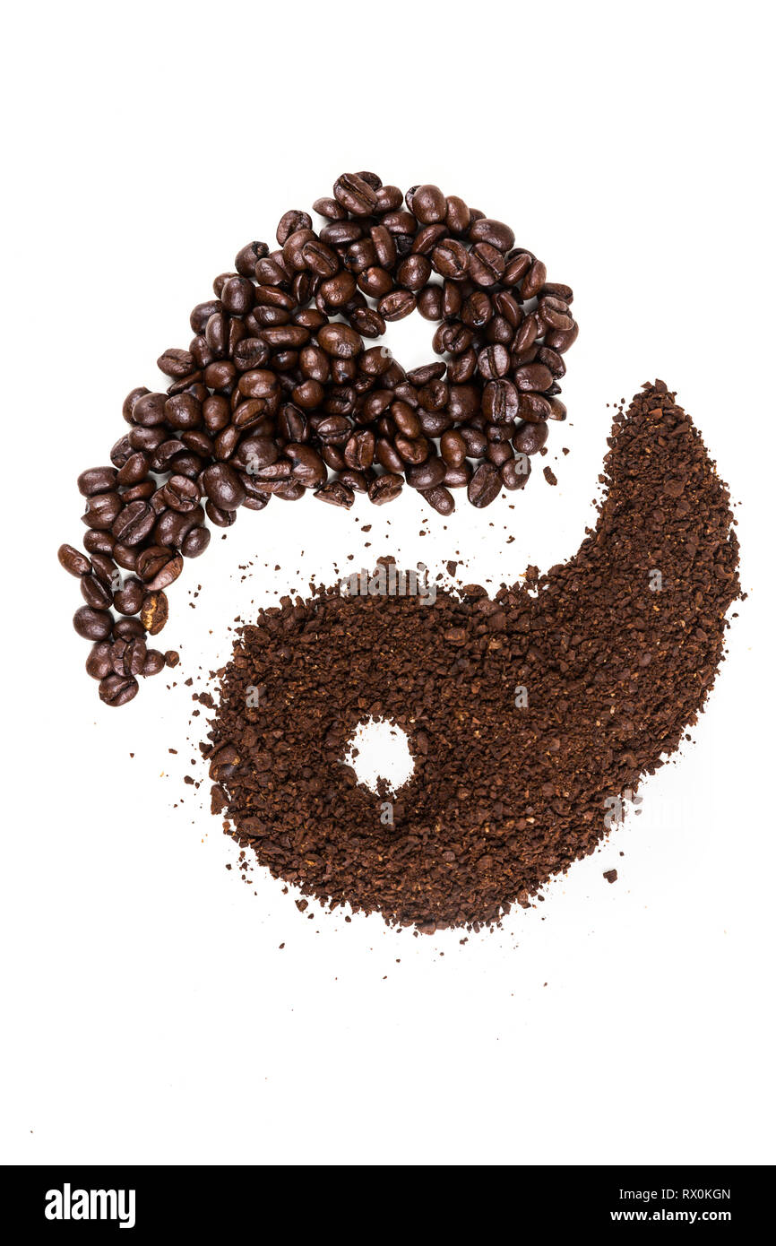 Balanced ying yang symbol of coffee beans and grounds Stock Photo - Alamy