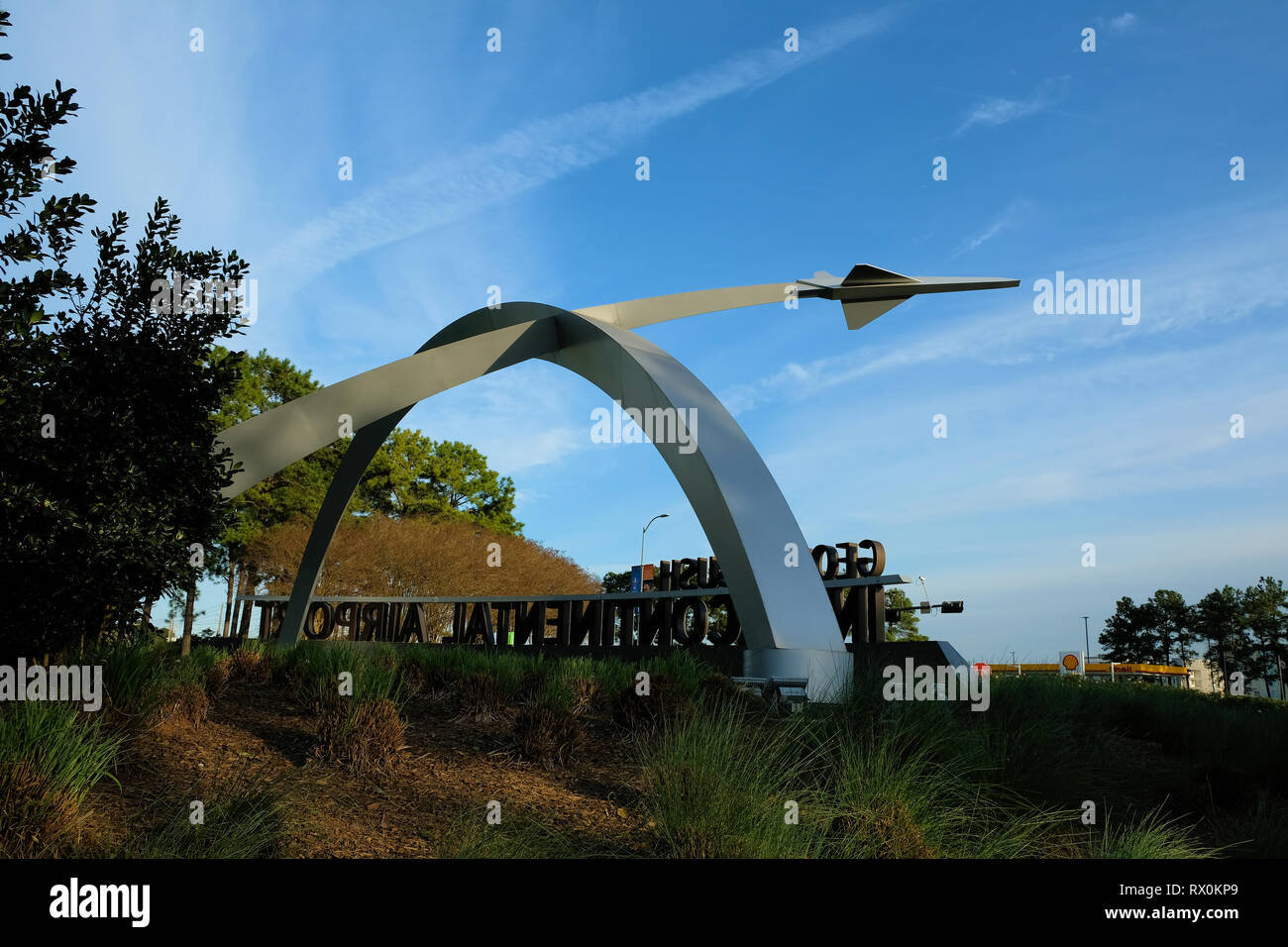 Entrance sign at George Bush Intercontinental Airport seen from behind ...