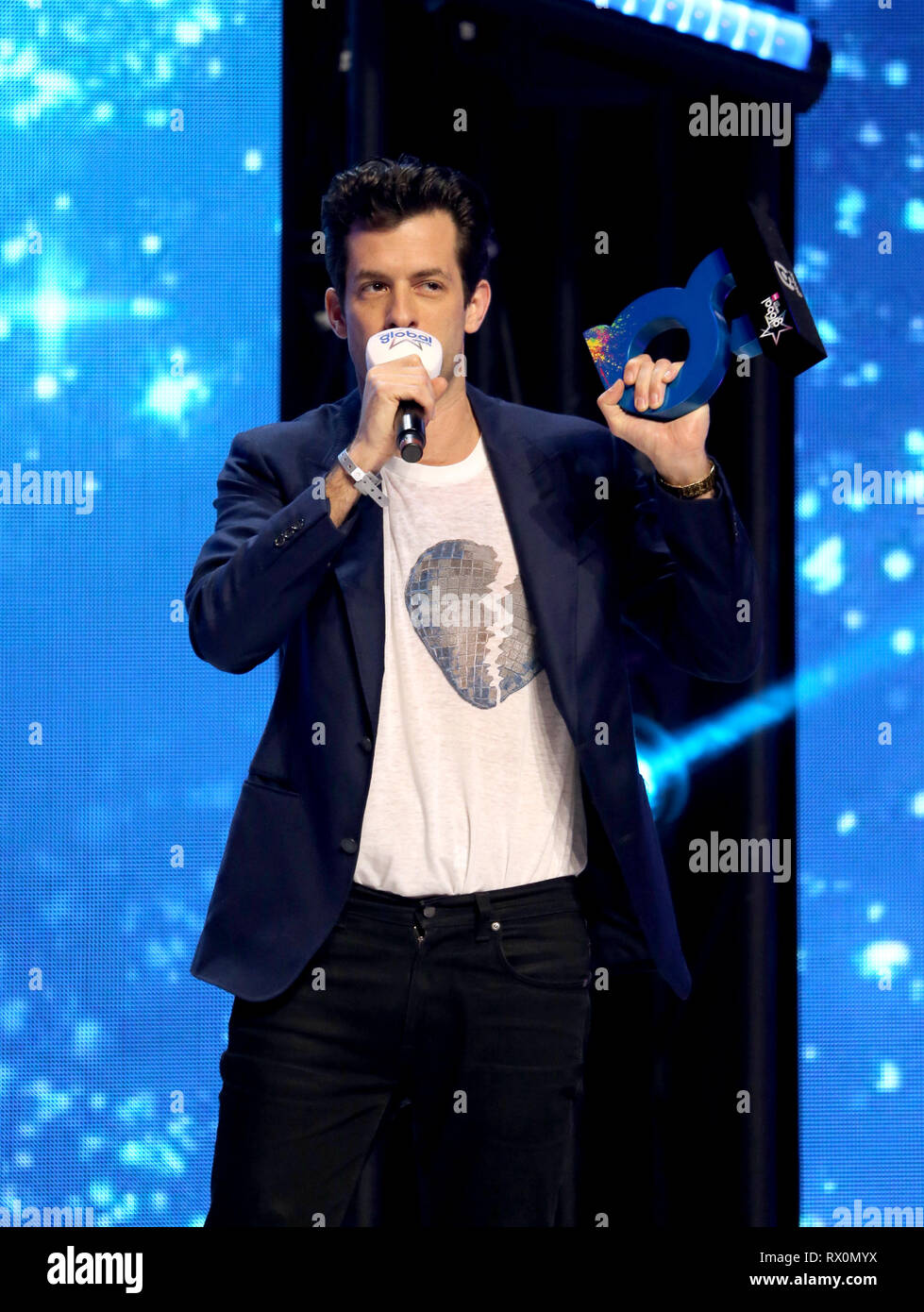 Mark Ronson on stage to collect his award for Best Male during The ...