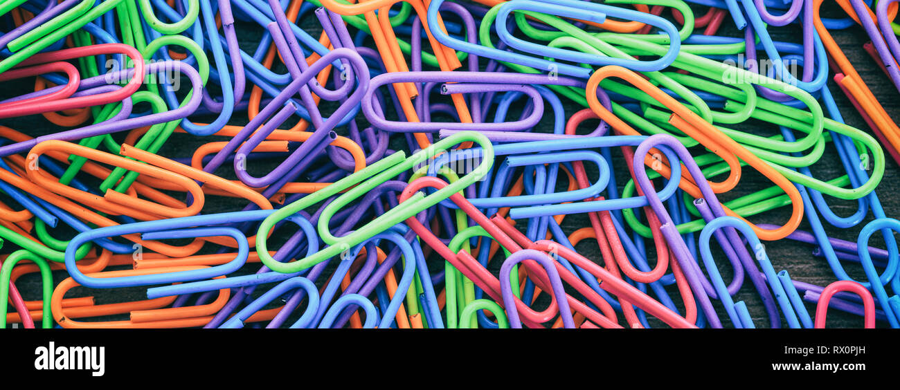 School, office supplies. Colorful paper clips background, banner, top ...