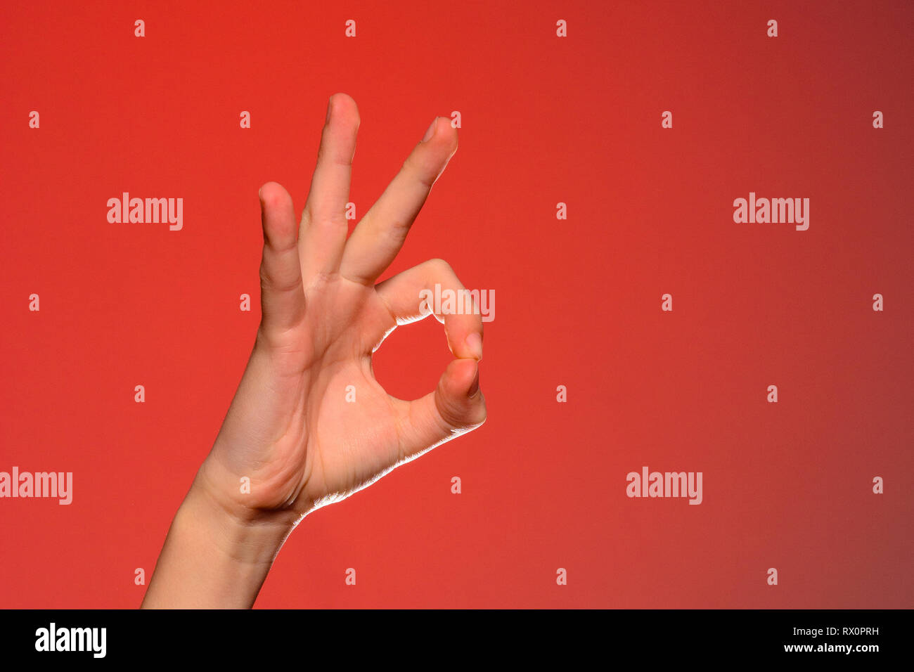 The human hand shows the sign ok symbolizing the positive, isolated on ...