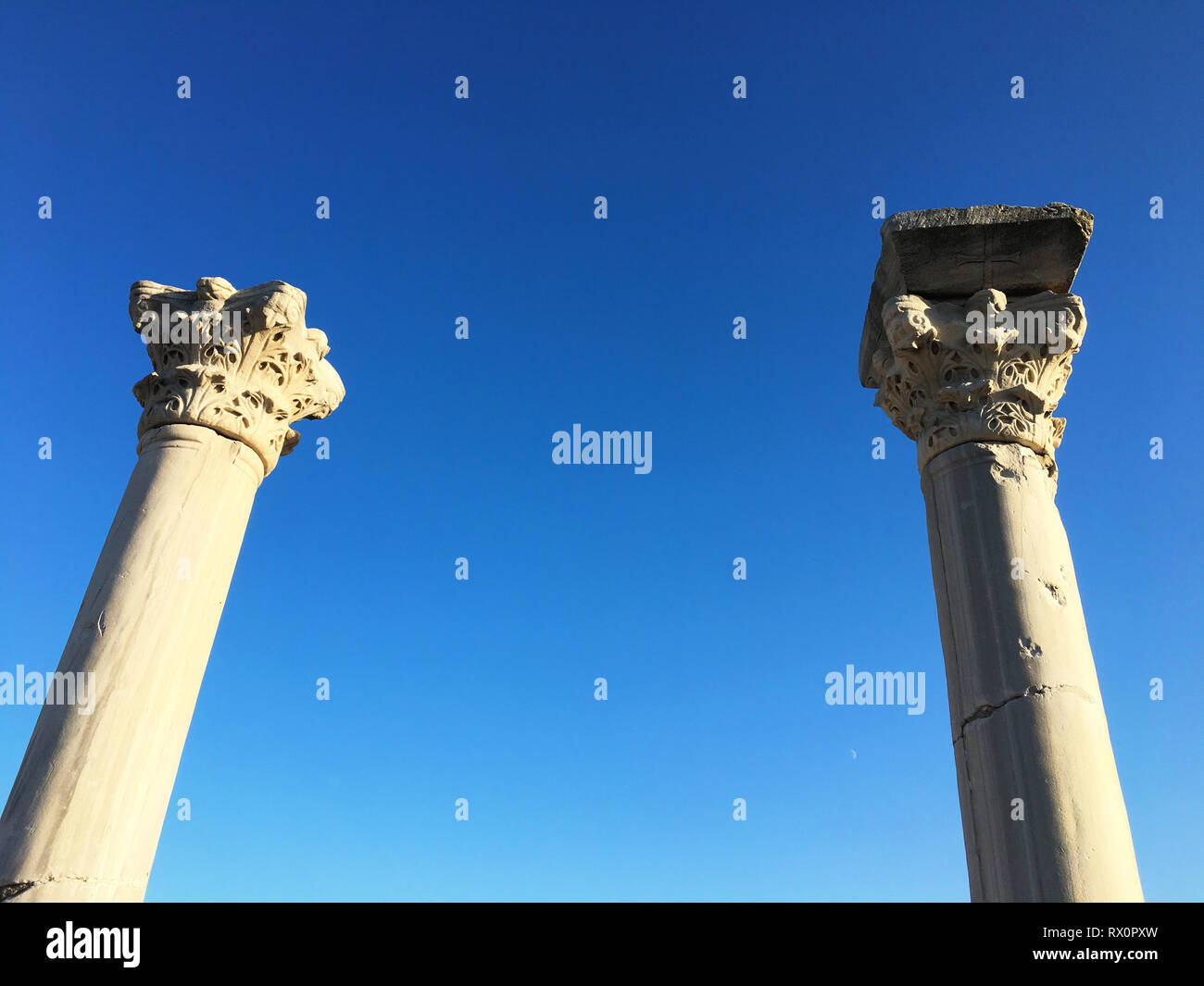 Ancient Roman time town in Crimea. Archeology antique columns on blue ...