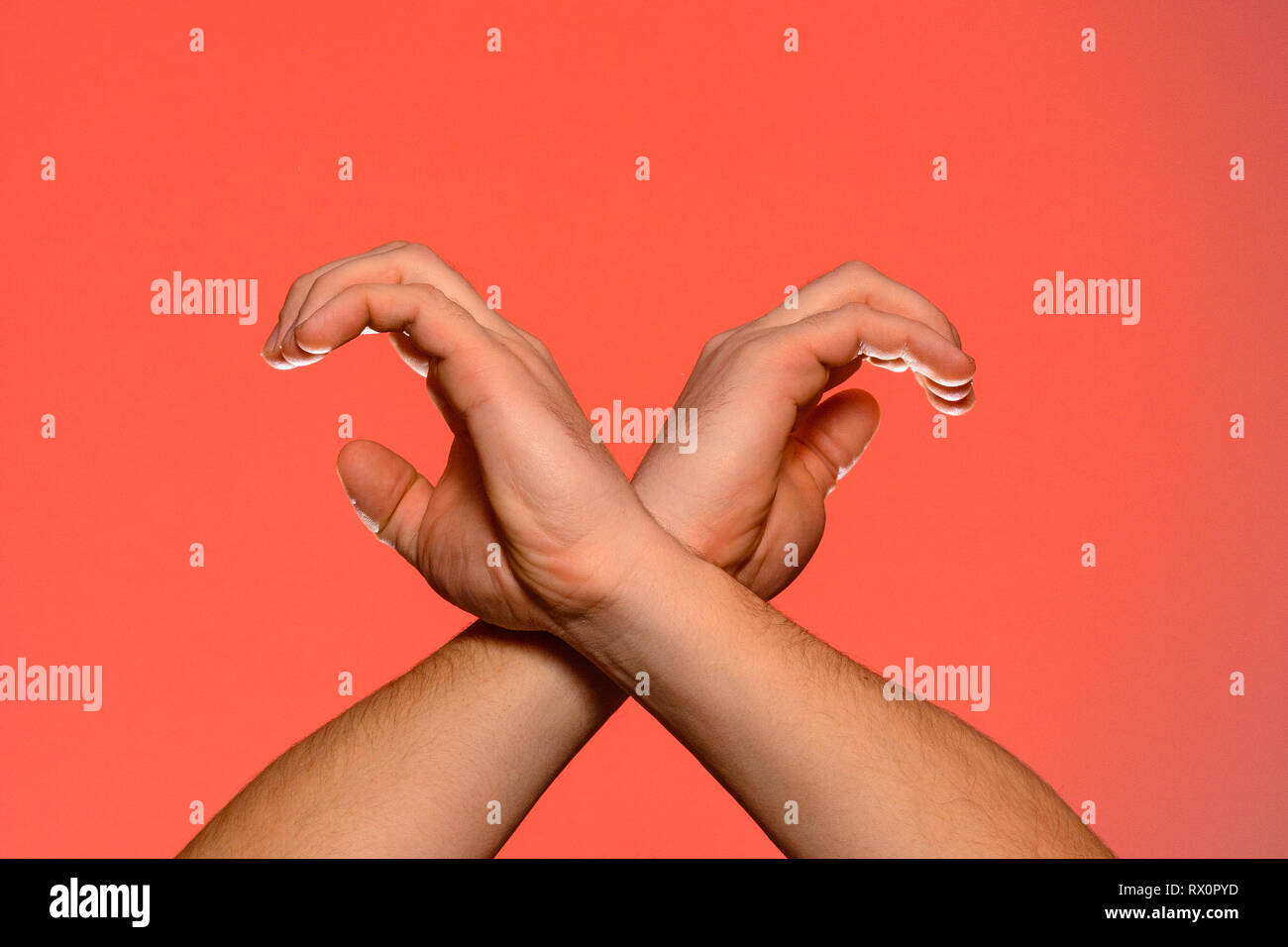 Two hands cross isolated hi-res stock photography and images - Alamy