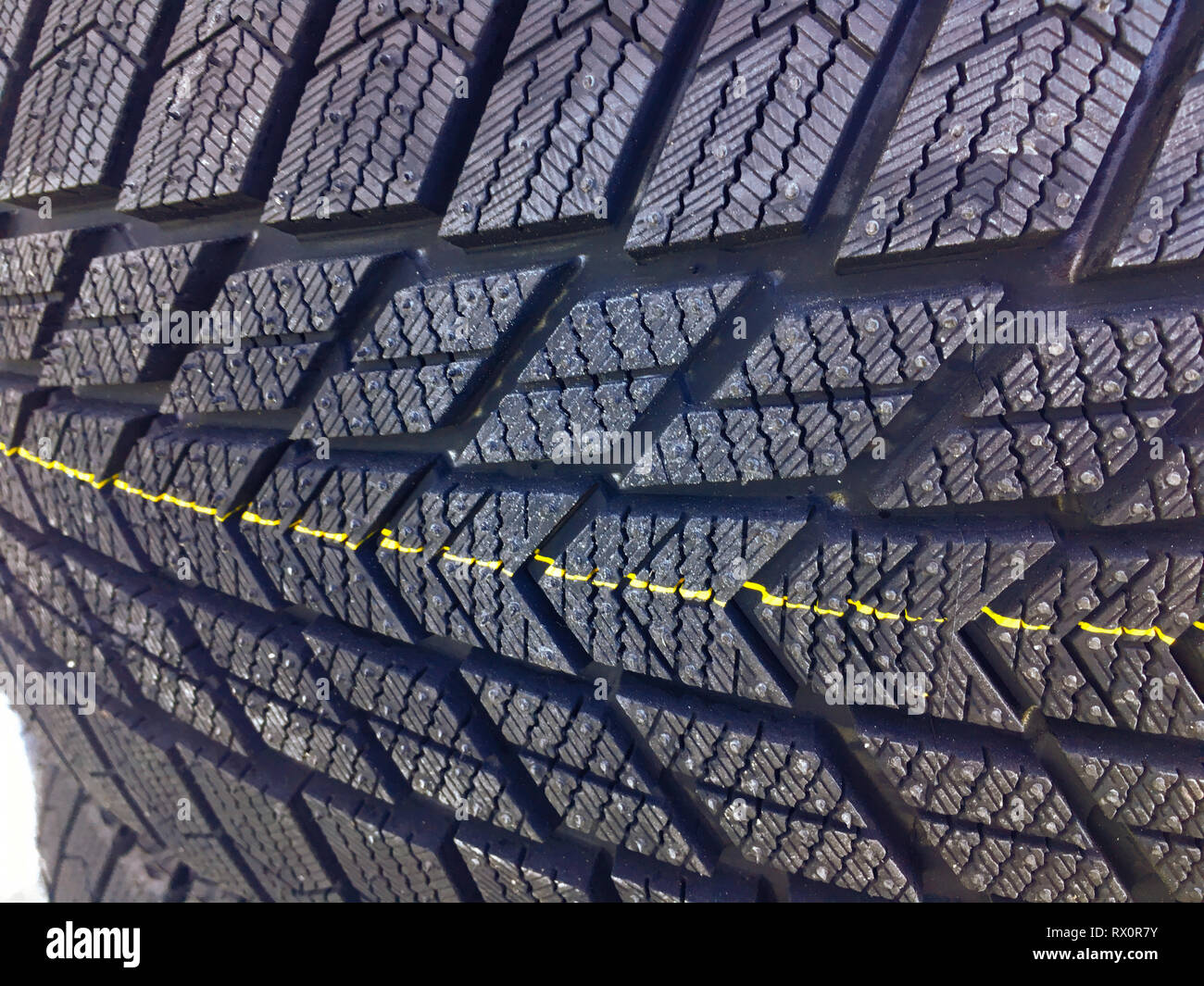 New car tire texture at the garage background Stock Photo - Alamy