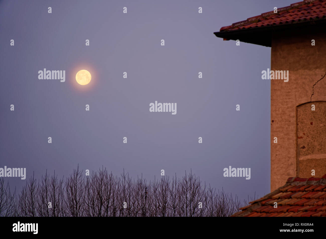 Moon in the morning, full old moon Stock Photo - Alamy