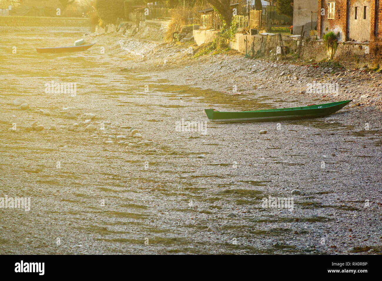 River drought, green boat without water due global warming Stock Photo ...