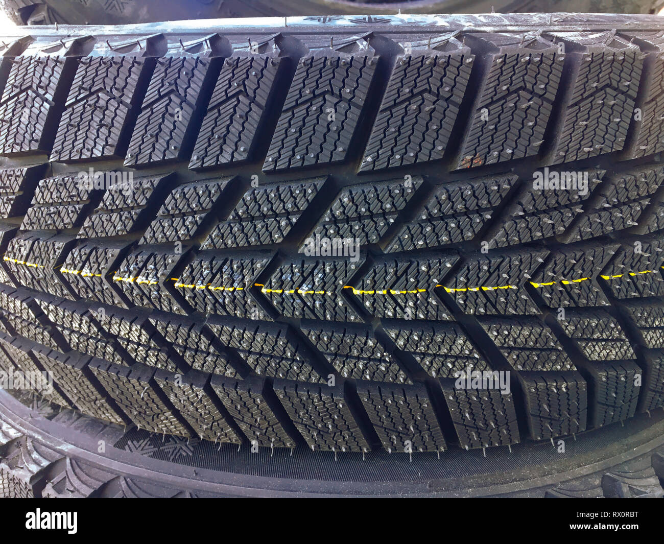 New car tire texture at the garage background Stock Photo - Alamy
