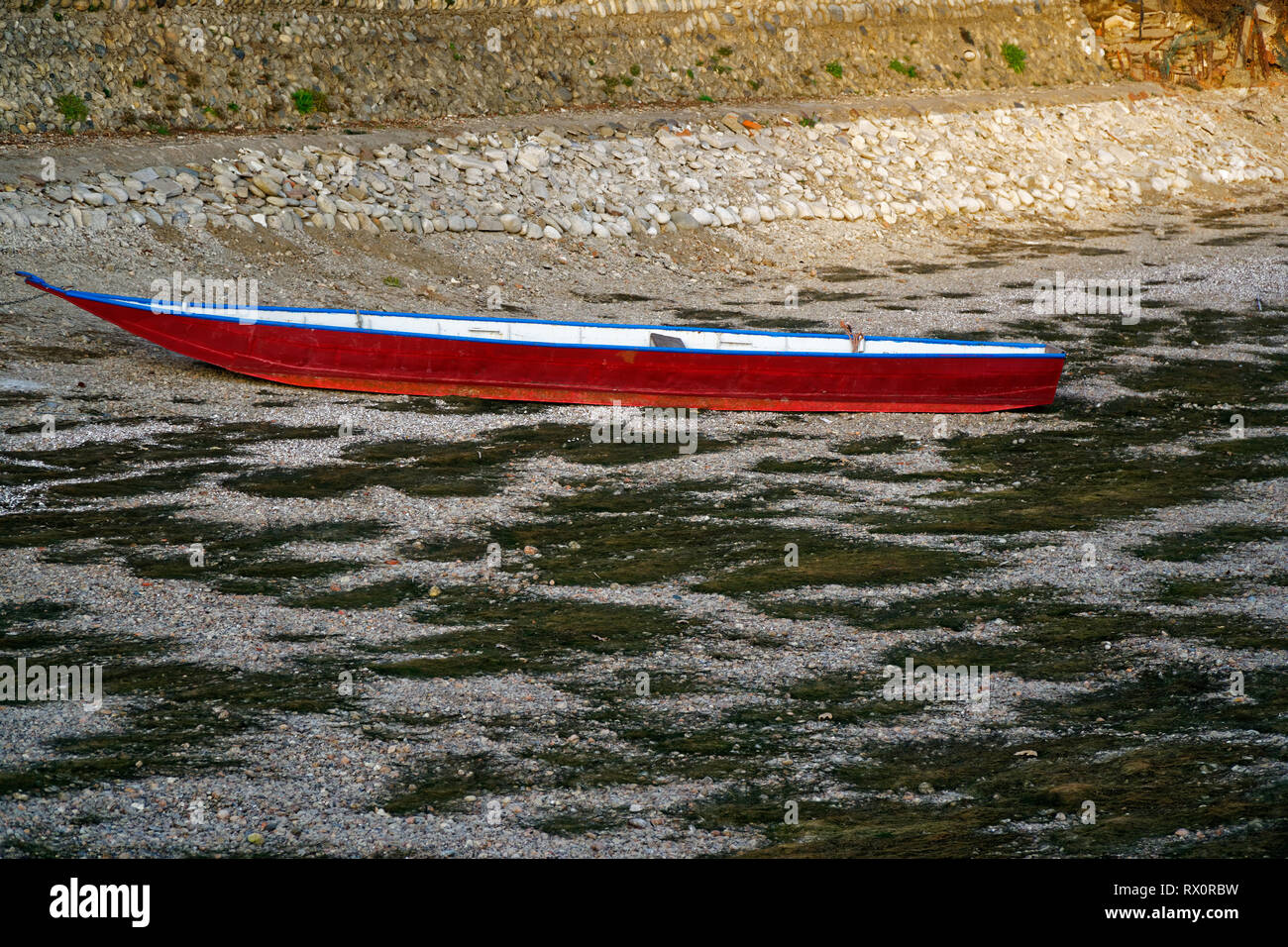River drought, red boat without water due global warming Stock Photo ...