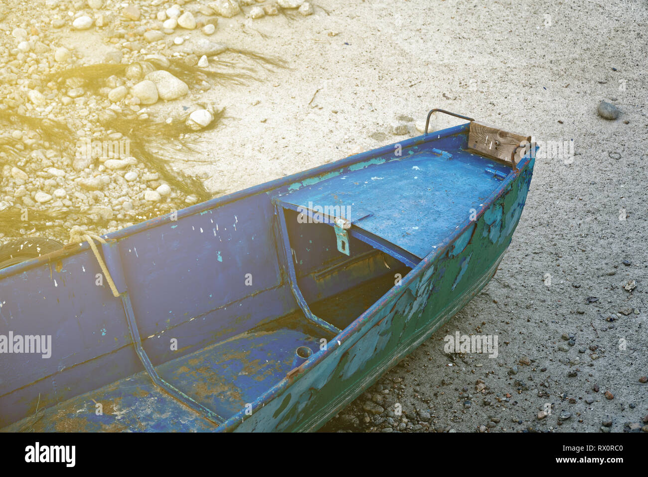 River drought, blue boat without water due global warming Stock Photo ...
