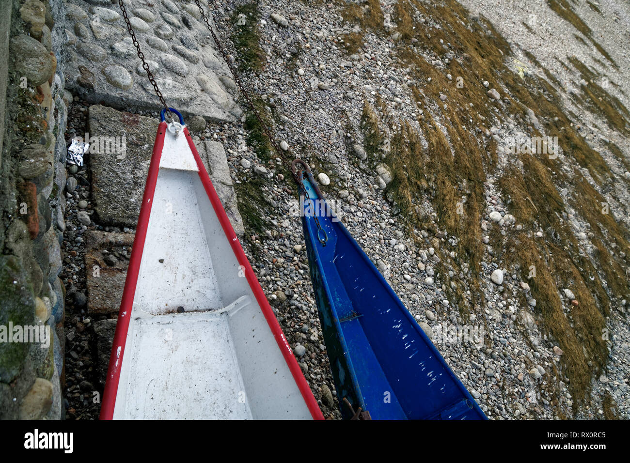 River drought, red and blue boats without water due global warming ...