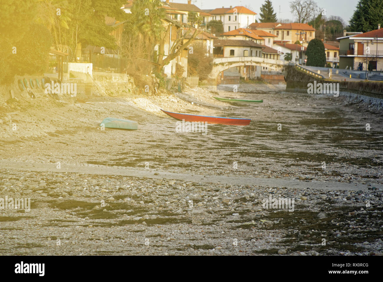River drought, red boat without water due global warming Stock Photo ...
