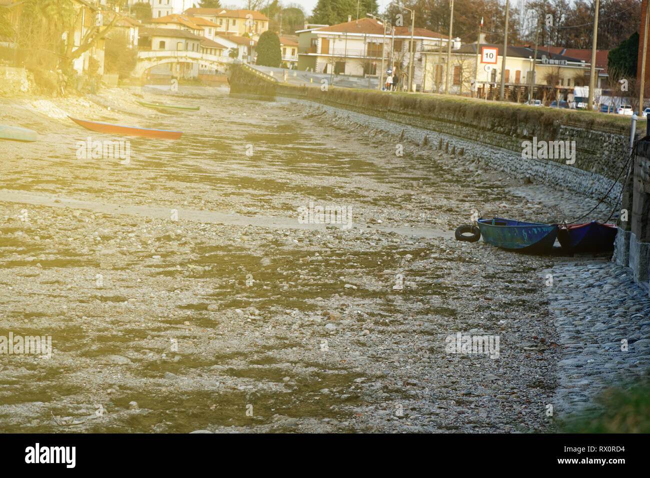 River drought, blue boat without water due global warming Stock Photo ...