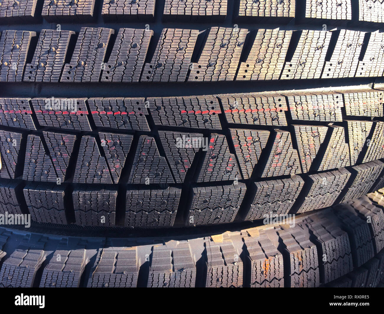 New car tire texture at the garage background Stock Photo - Alamy