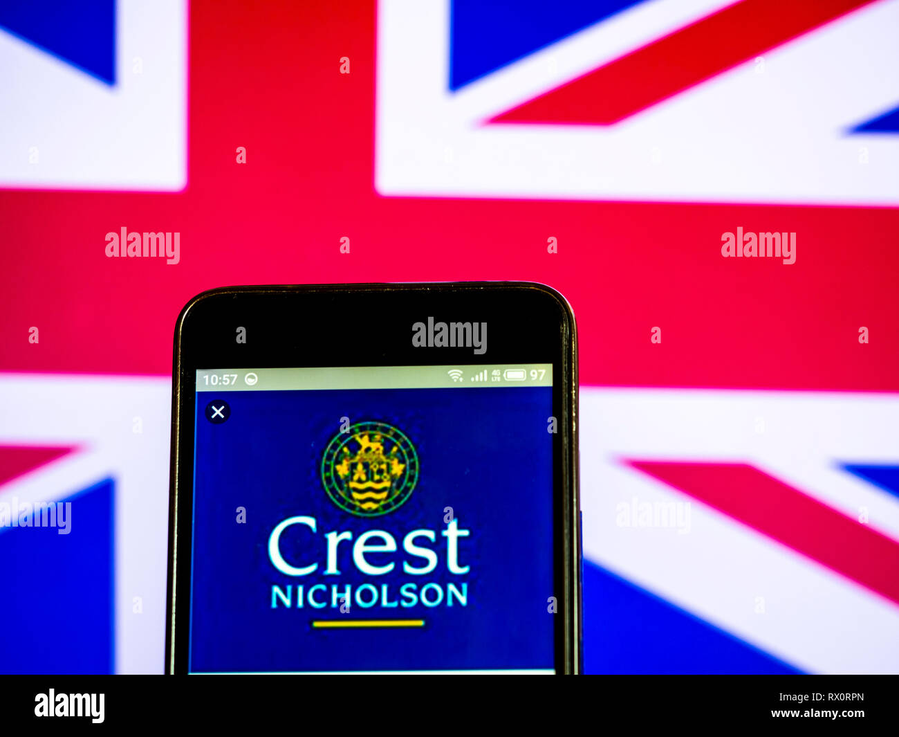 Crest Nicholson company logo seen displayed on smart phone Stock Photo ...