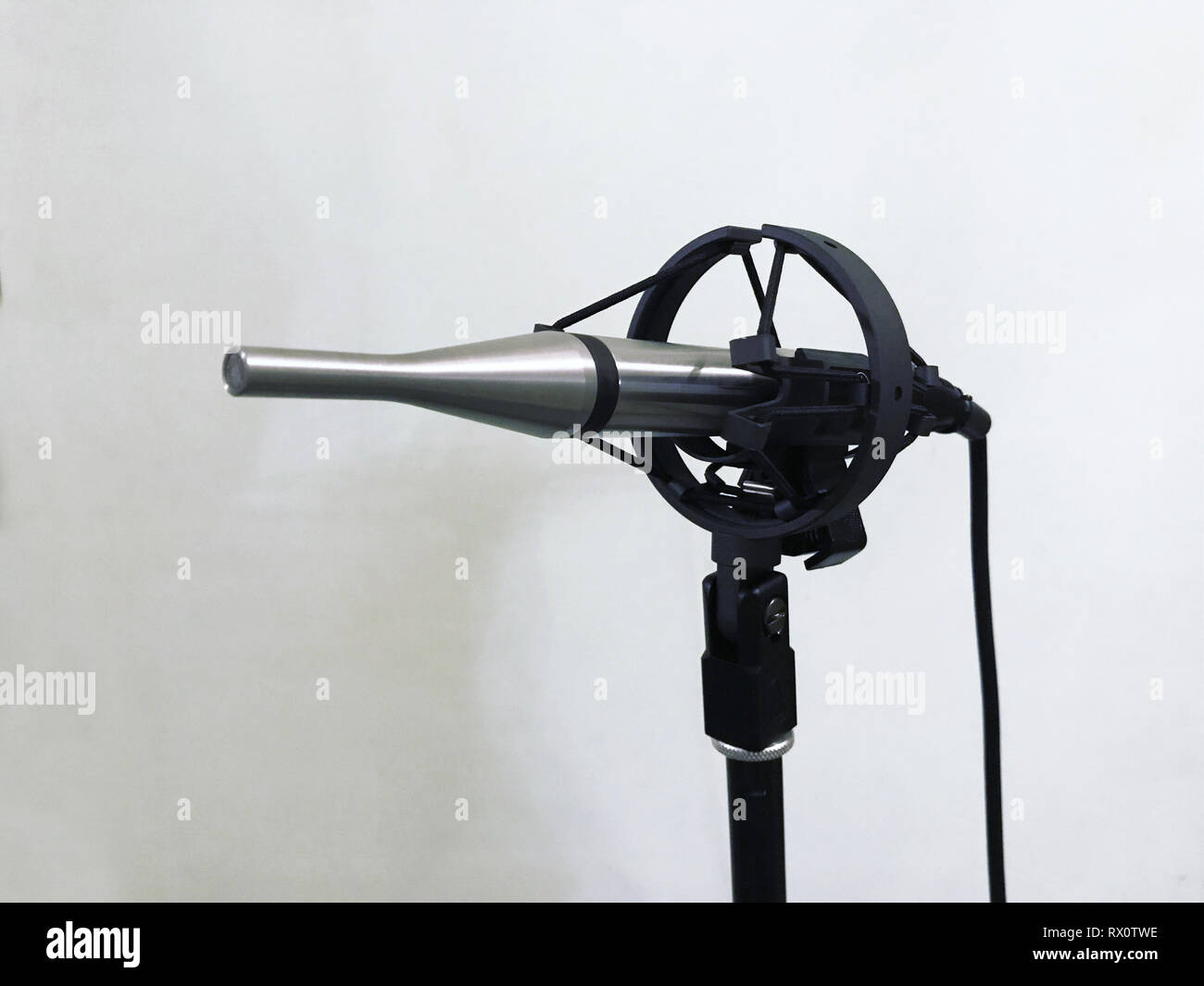 Measuring microphone at sound studio on white background Stock Photo ...
