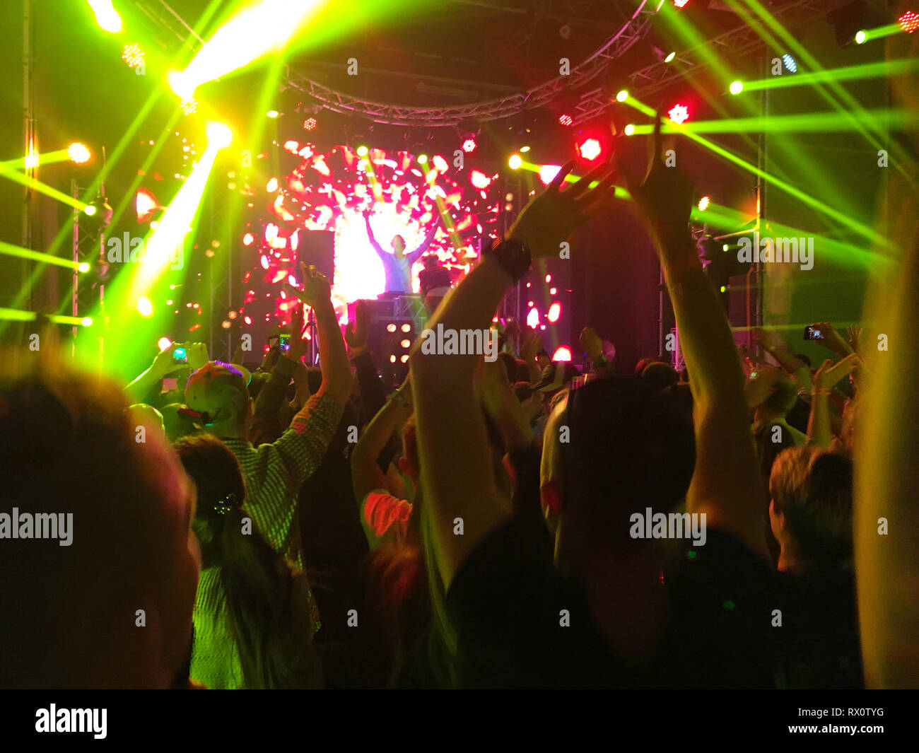 Hands up crowd bar hi-res stock photography and images - Alamy