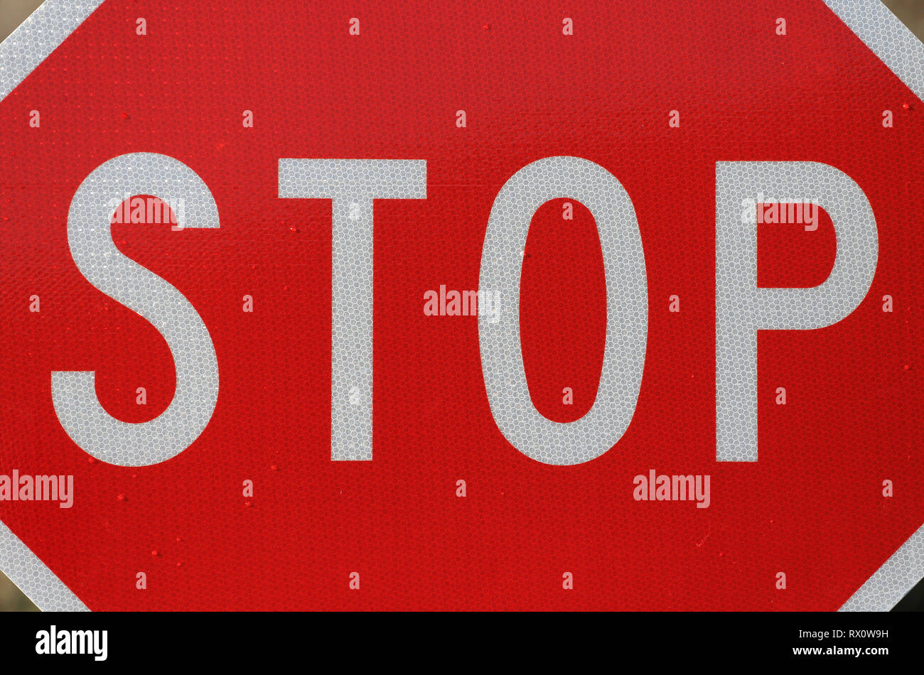 Stop sign at railway crossing Stock Photo - Alamy