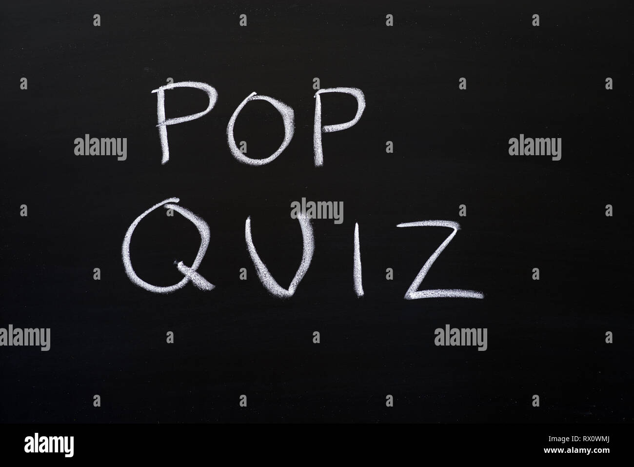 pop quiz written on a blackboard with white chalk Stock Photo - Alamy