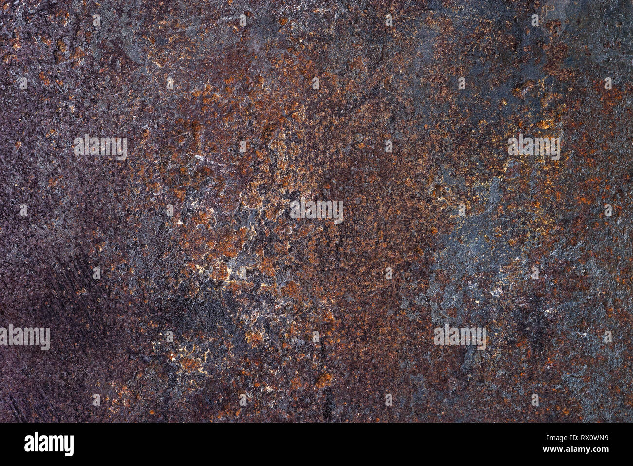 old pitted rusty iron background texture Stock Photo - Alamy