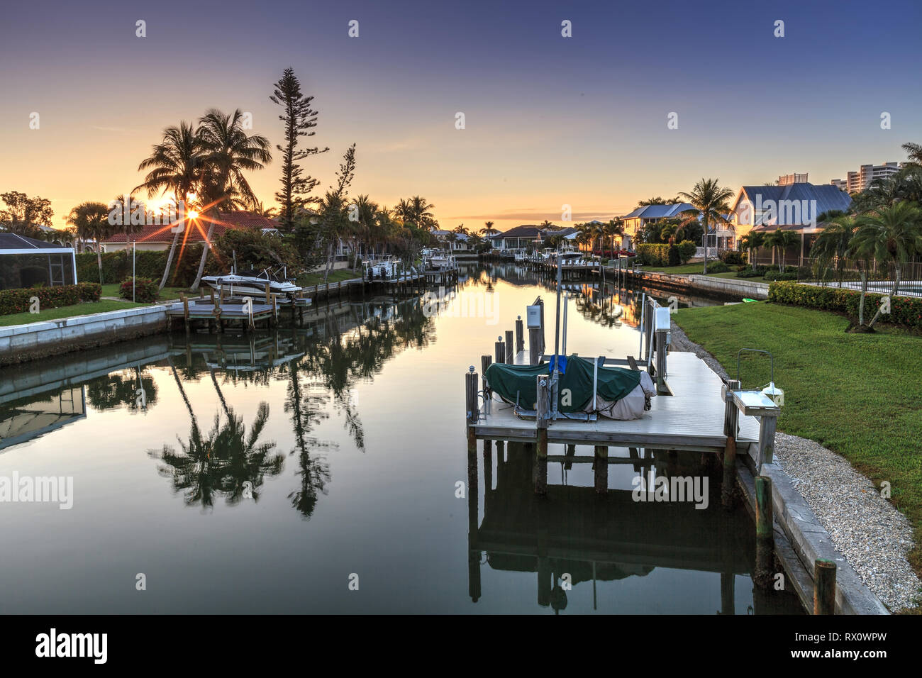 Riverway that leads to the ocean on Marco Island, Florida at Sunrise ...