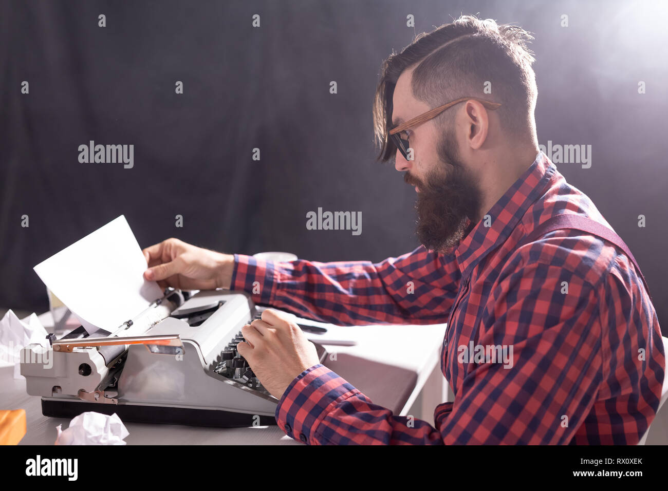 people, writer and hipster concept - young stylish writer working on ...
