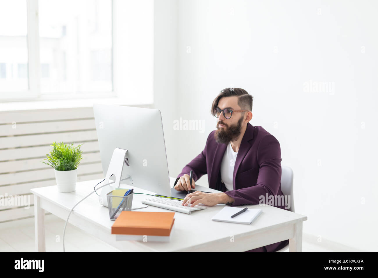 people, design and style concept - graphic designer sketching new ...