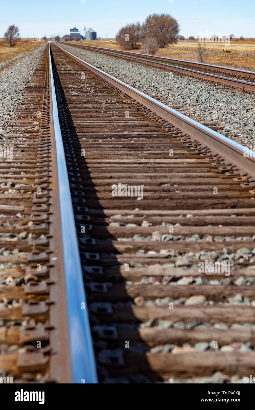 Close up of railway tracks stretching into the distance Stock Photo - Alamy