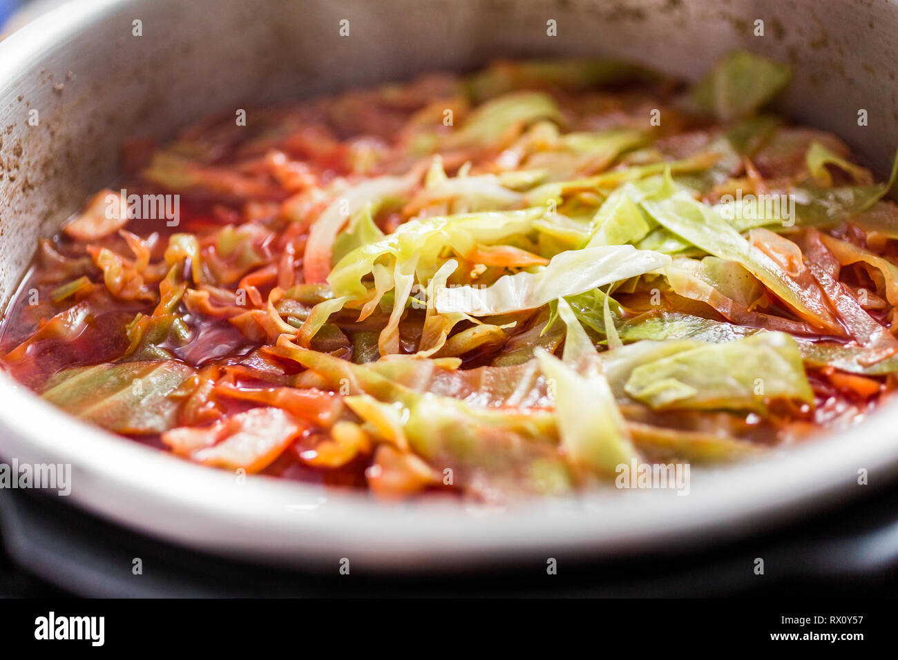 Cooking borscht in electric multi cooker Stock Photo - Alamy