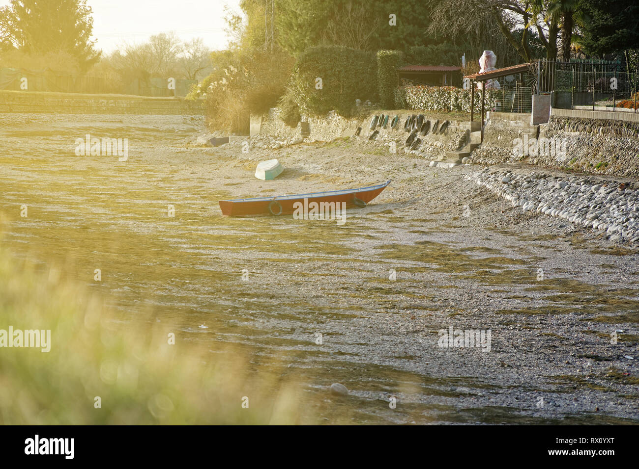 River drought, boat without water due global warming Stock Photo - Alamy