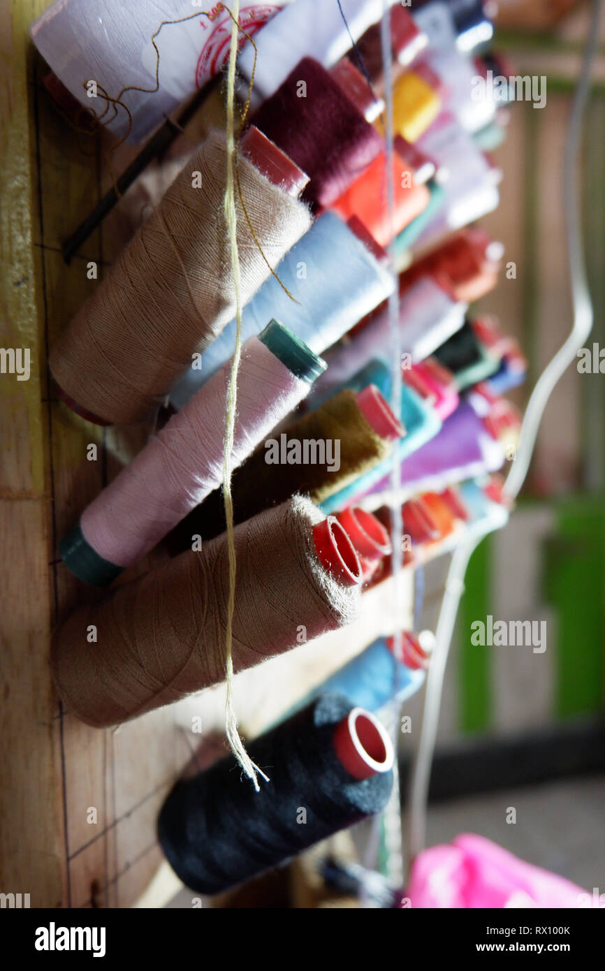 various colors of thread for sewing Stock Photo - Alamy