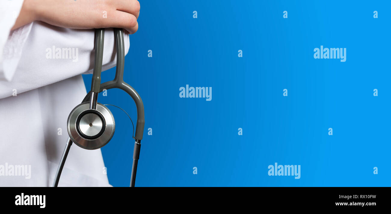 Medical blue background doctor with a stethoscope Stock Photo - Alamy
