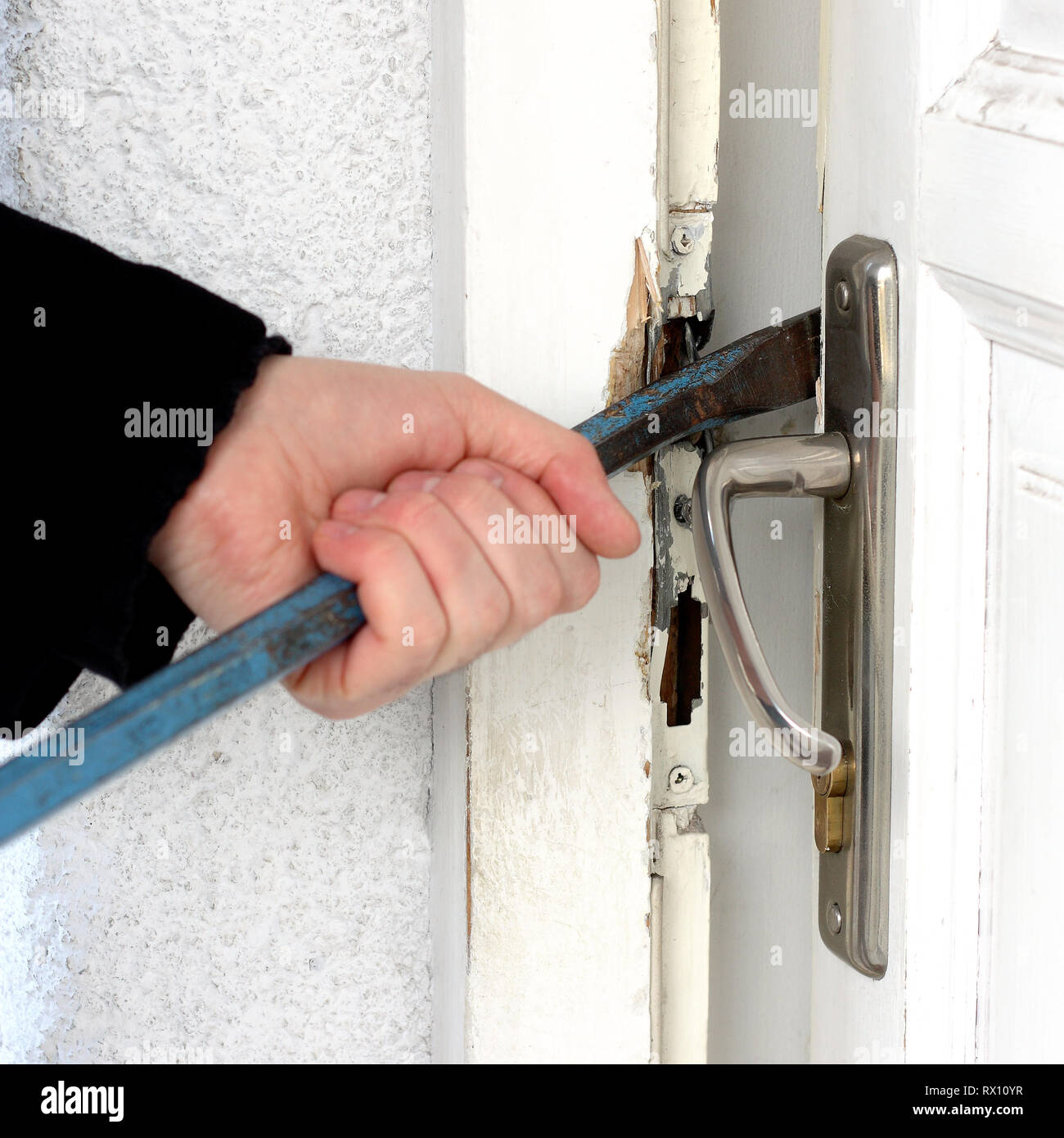 Burglar breaking into a house Stock Photo - Alamy