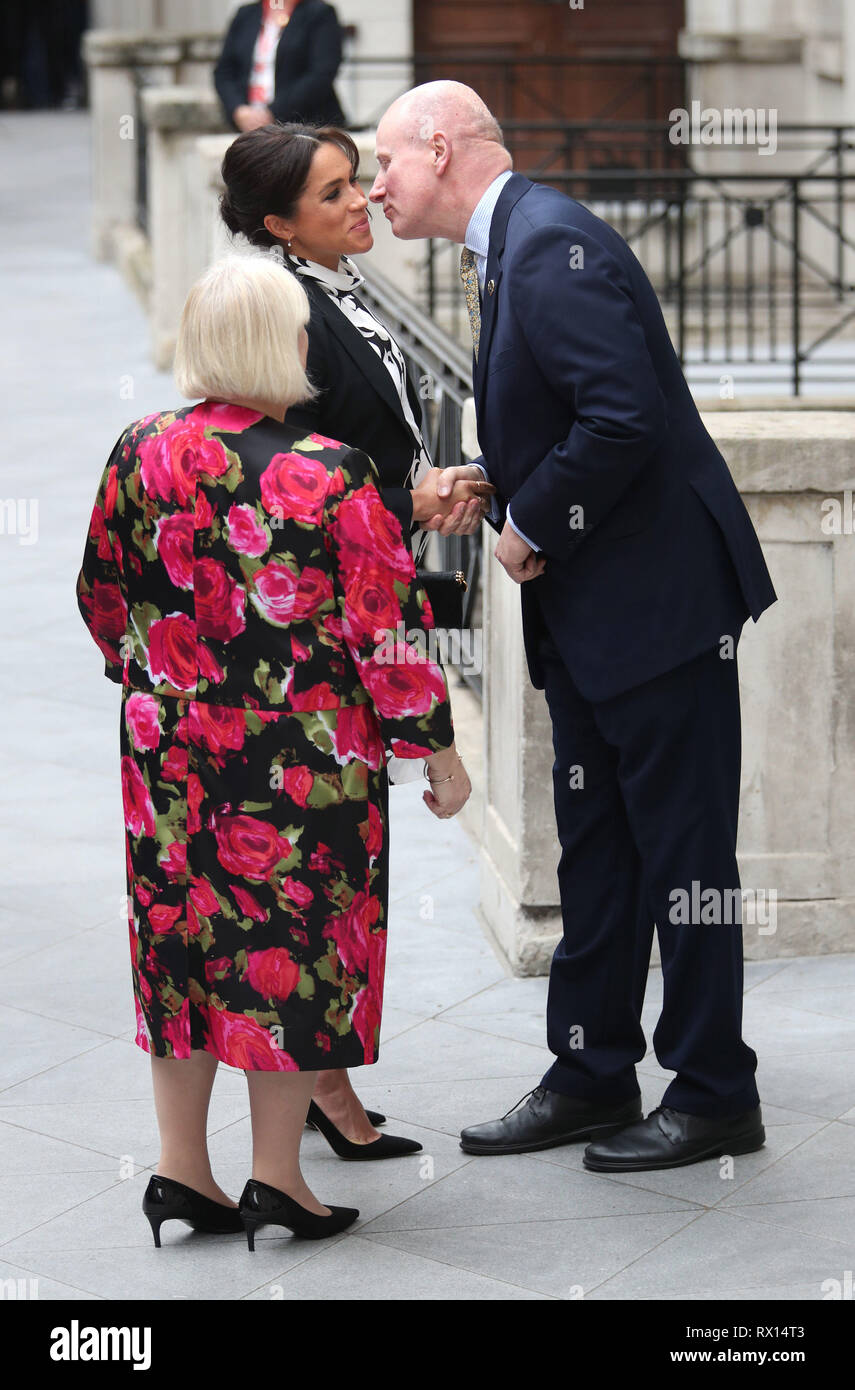 The Duchess of Sussex is greeted by Lord Geidt, former Private ...