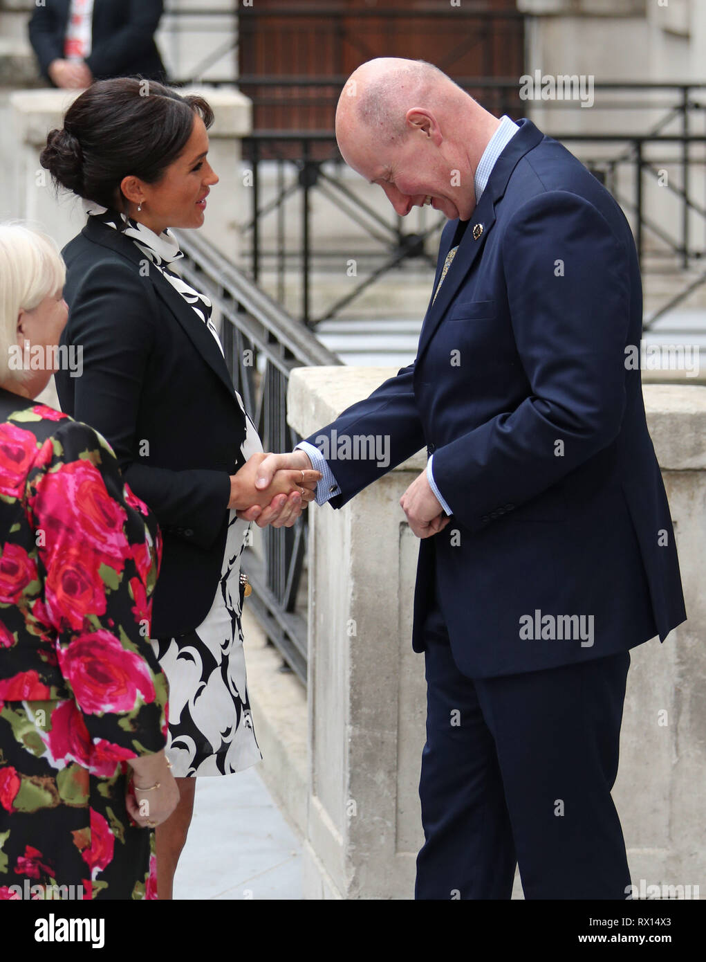 The Duchess of Sussex is greeted by Lord Geidt, former Private ...