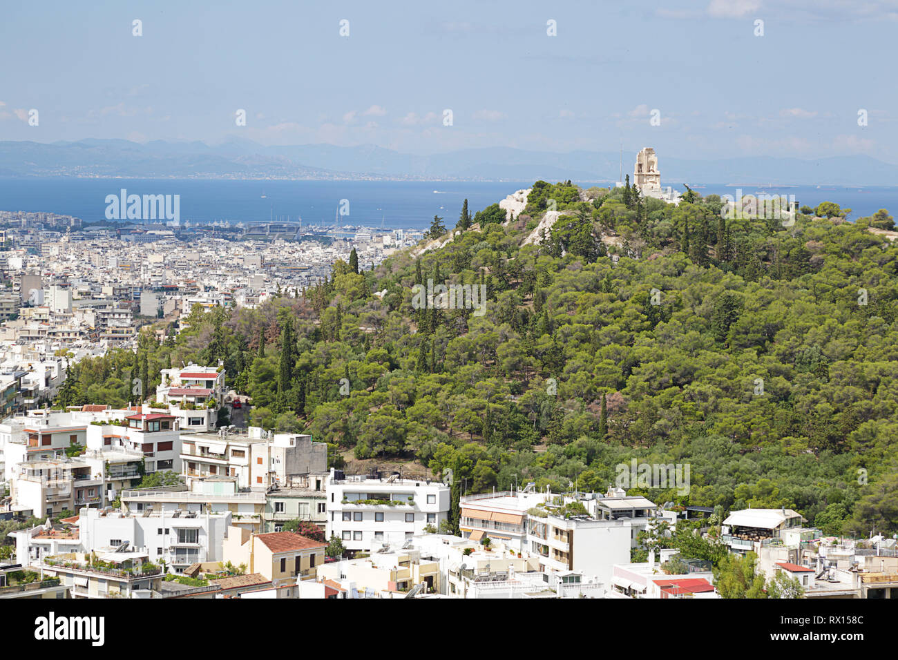 Filopappou (or Philopappou) monument on the green hill in Athens and ...