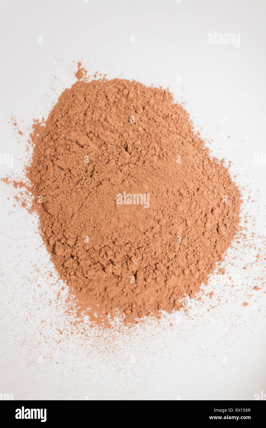 Dry cocoa powder poured in a mixing bowl Stock Photo - Alamy