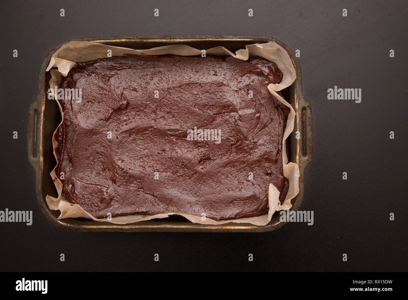 Prepared dough for dessert chocolate brownie before baking Stock Photo ...