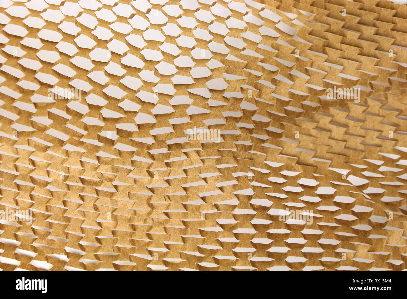 Recycled ruffled wrapping paper with holes, abstract background Stock ...