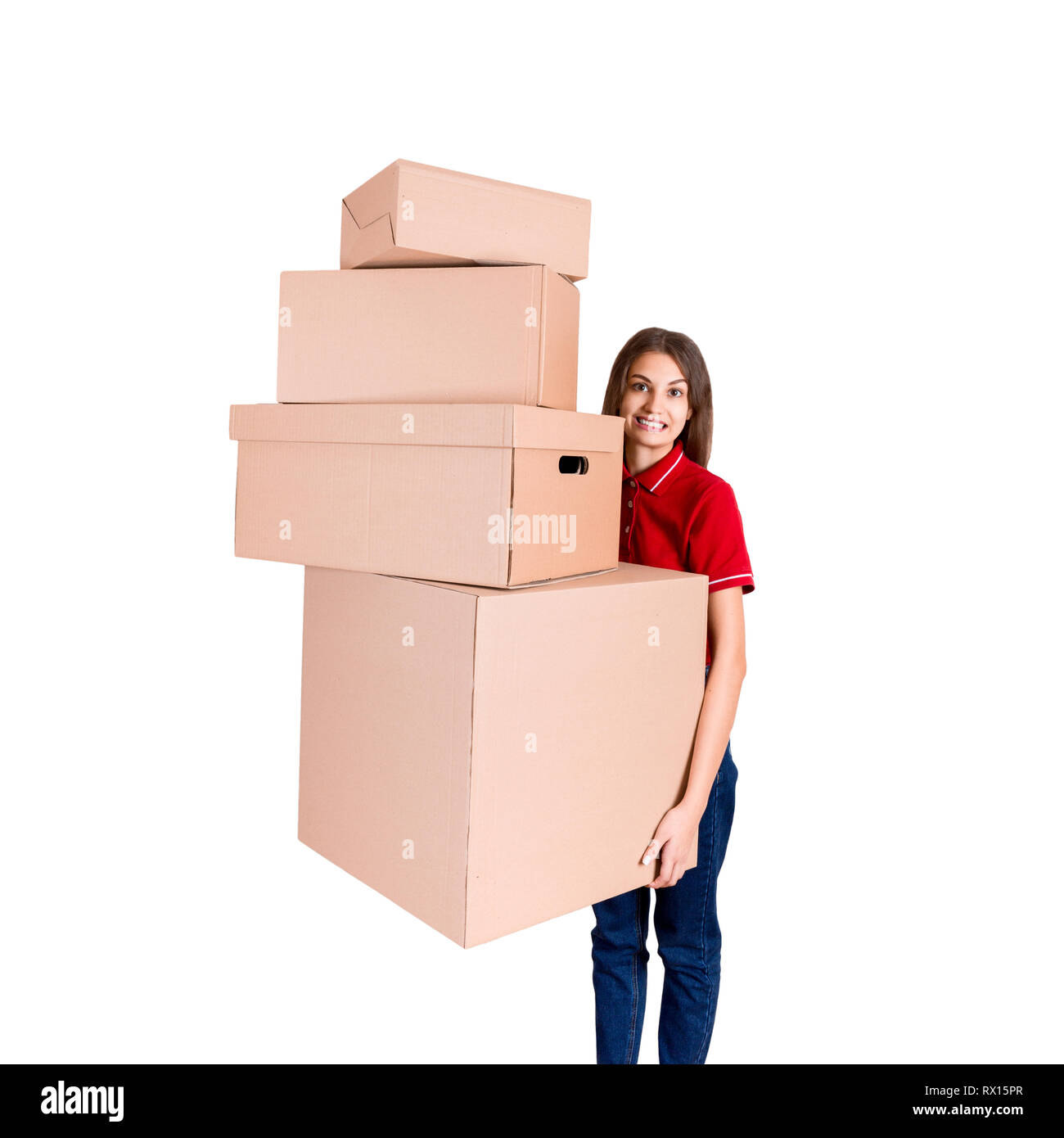 Portrait of a happy smiling delivery woman with heap of big boxes ...