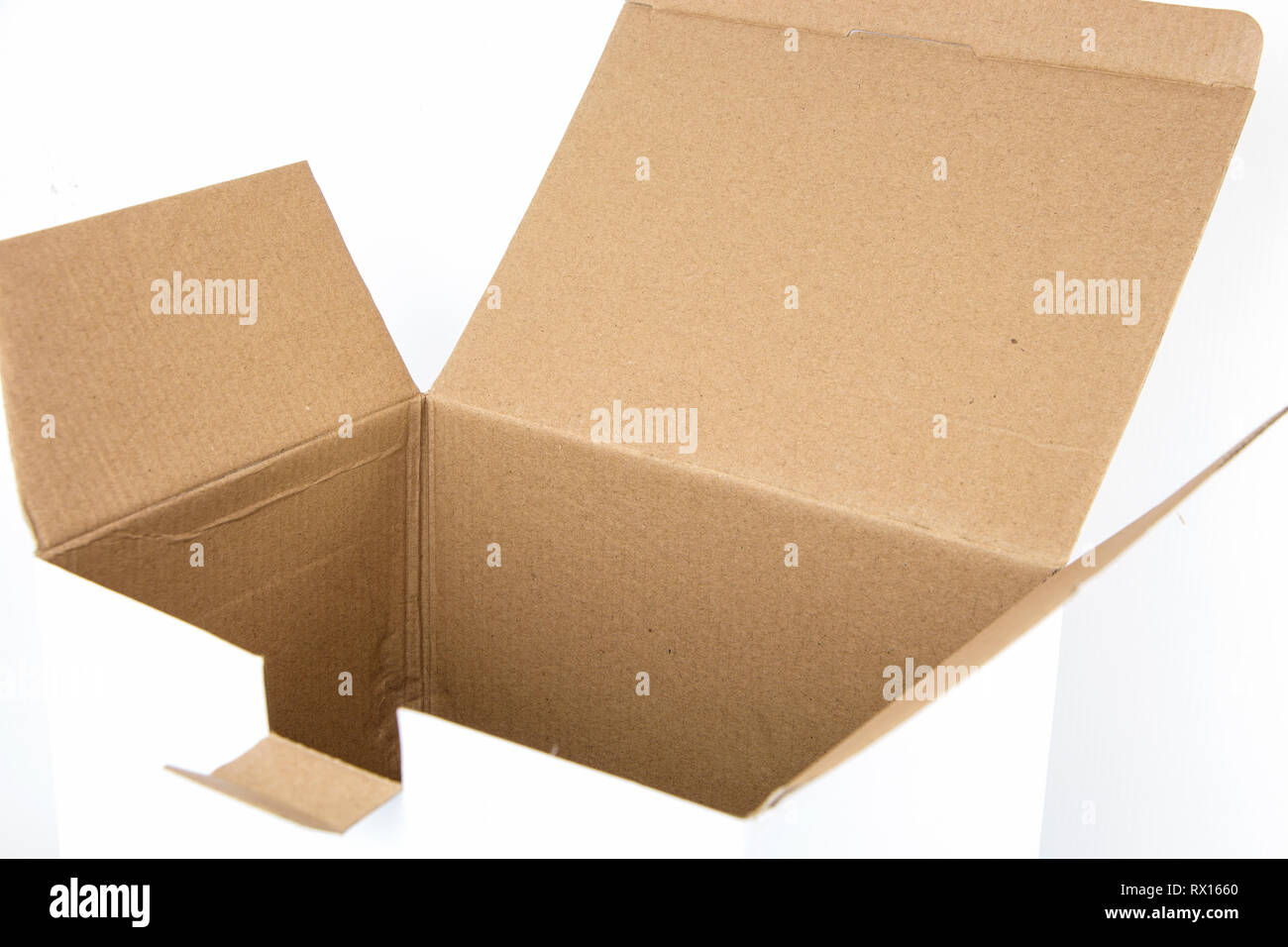White opened cardboard box isolated on white background Stock Photo - Alamy