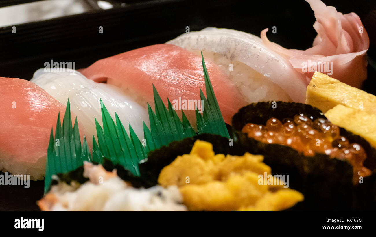 Japanese Sashimi and nori-wrap sushi platter Stock Photo - Alamy