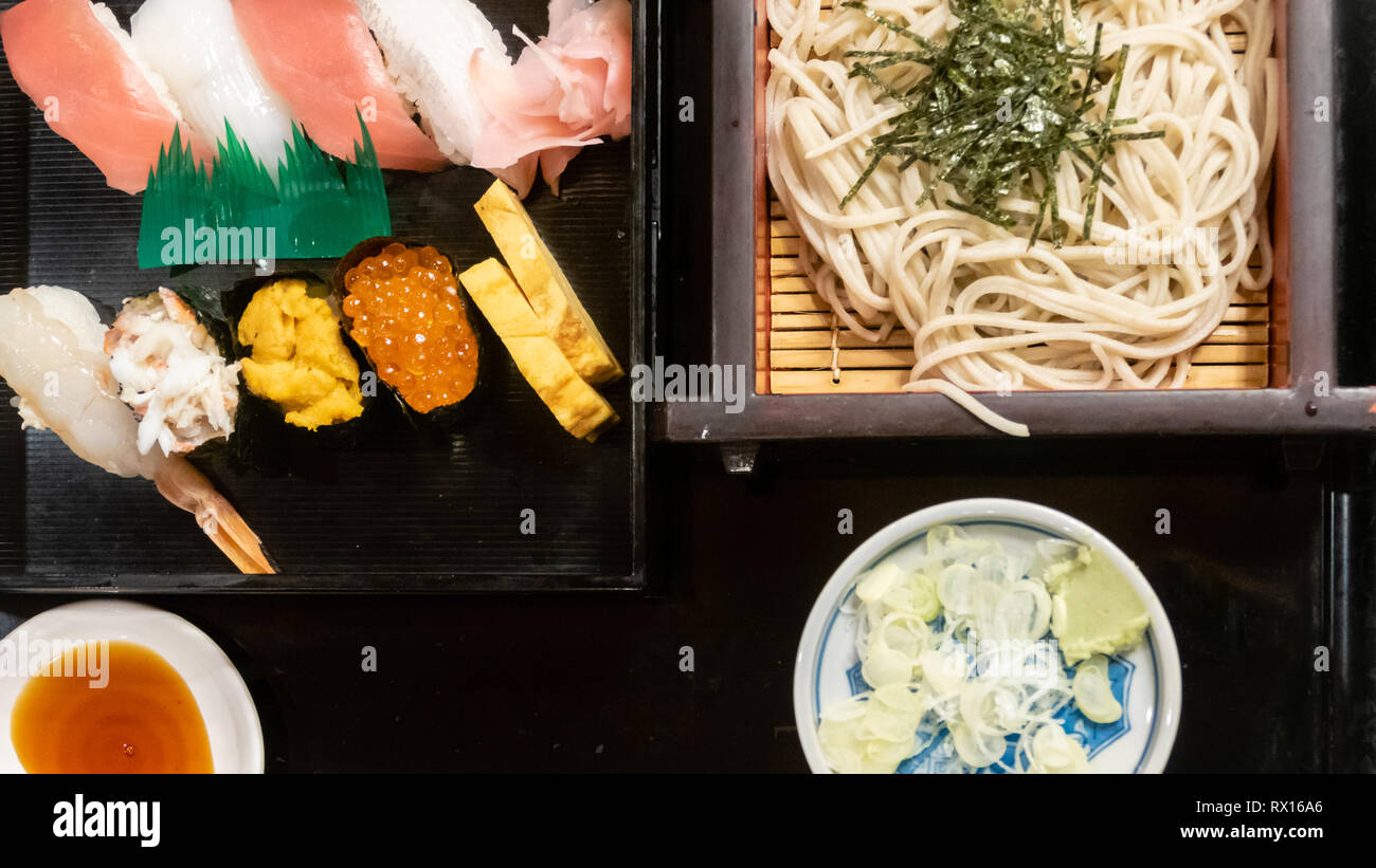 Japanese soba noodles, sashimi and nori-wrap sushi platter Stock Photo ...